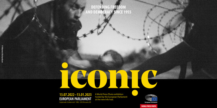 How does an iconic photo help defend democracy?